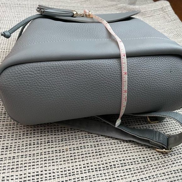 unbranded | Bags | Nwot Faux Leather Backpack With Tassel And Gold ...